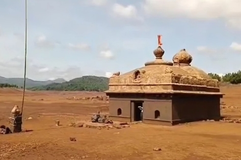Ancient Kambareshwar Temple emerges from Bhatghar Dam waters as water ...